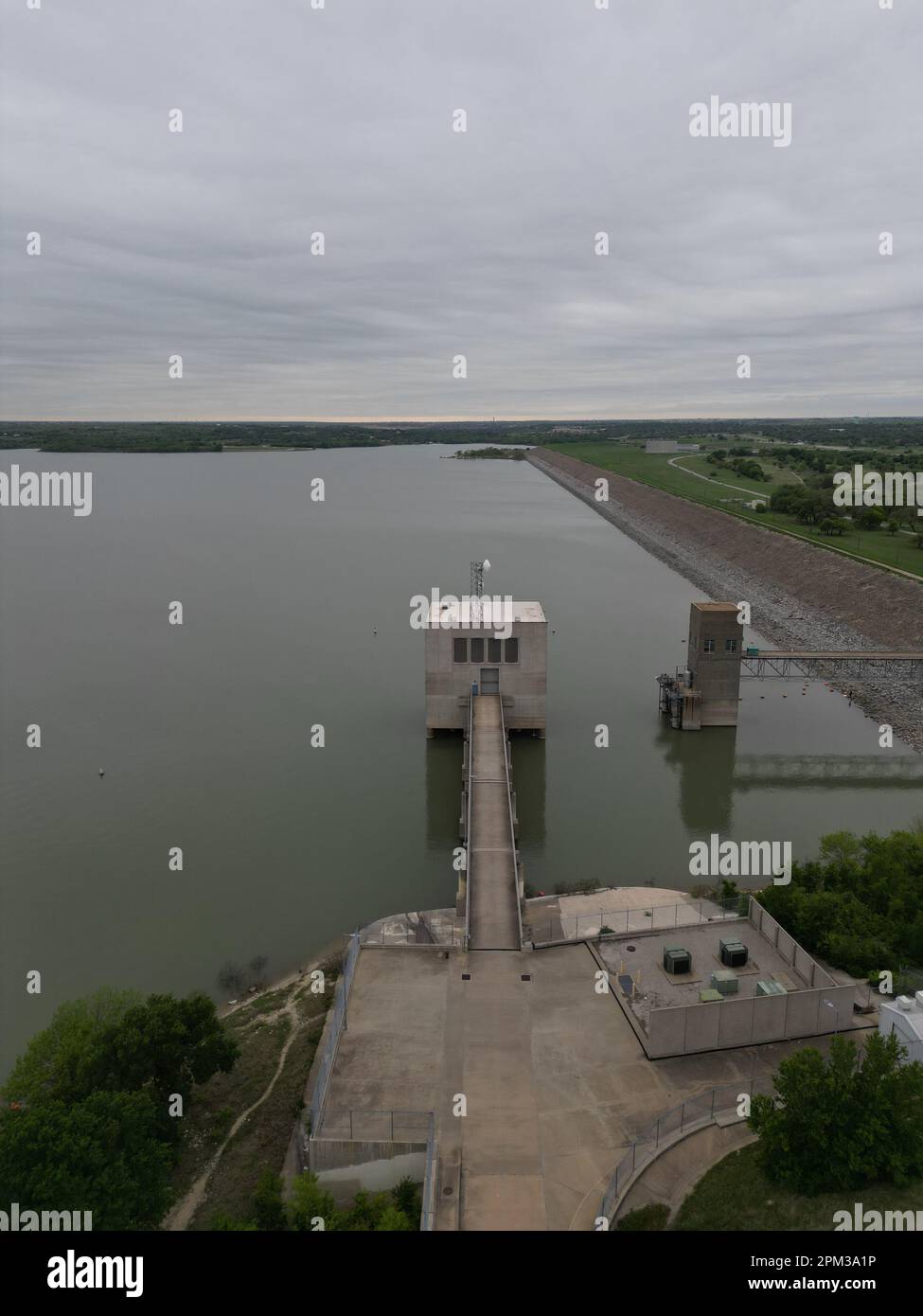 The fascinating Benbrook Lake with a pier extending out into the water ...