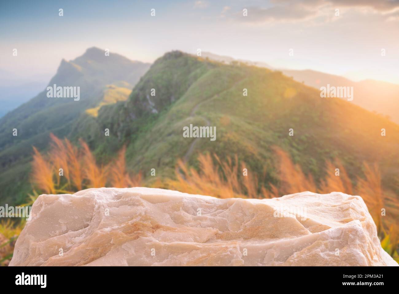 Stone podium outdoors on golden sky sunset with beautiful misty ...