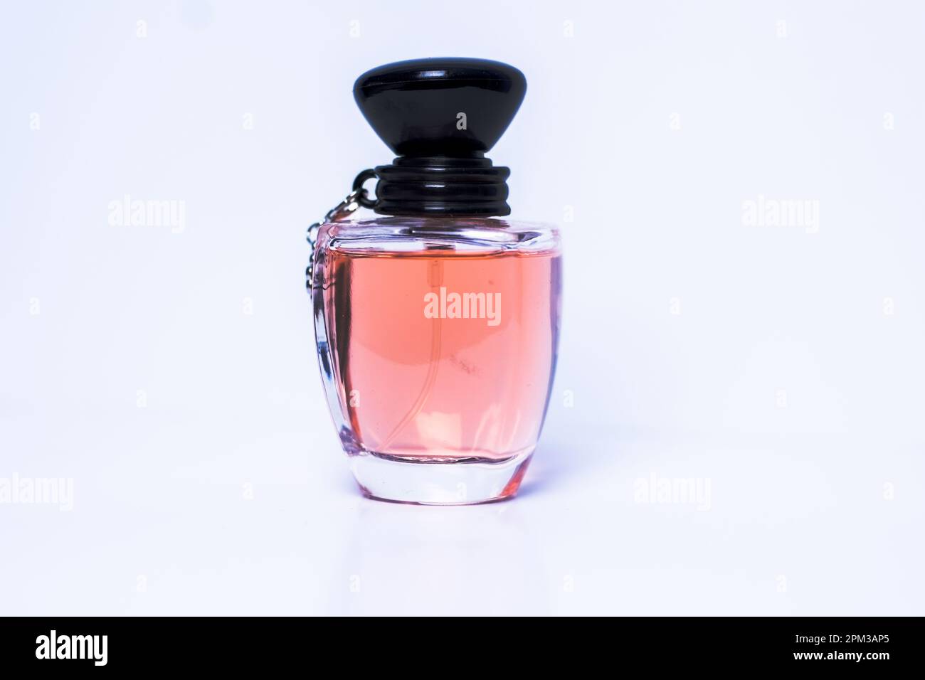 A transparent glass perfume bottle isolated on white background Stock ...