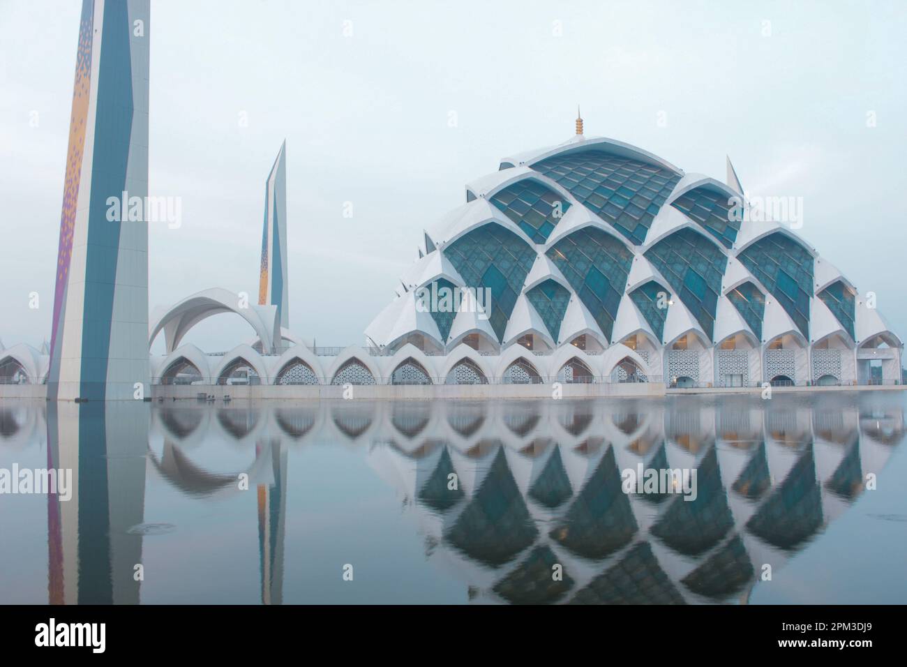 Landscape grand mosque of al jabbar with slightly cloudy skies in the ...