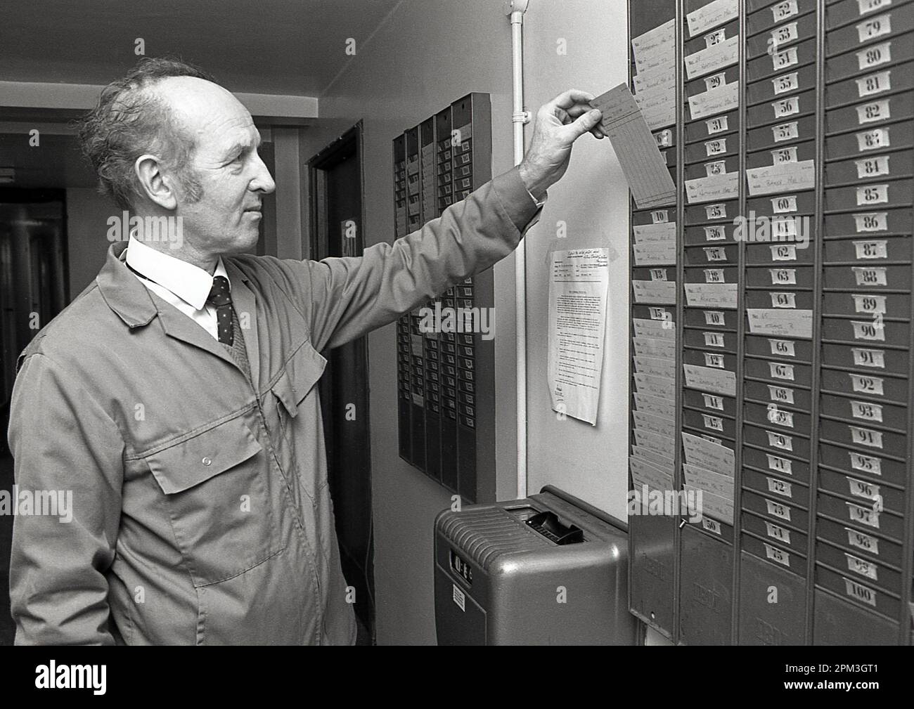 Clocking out factory hi-res stock photography and images - Alamy