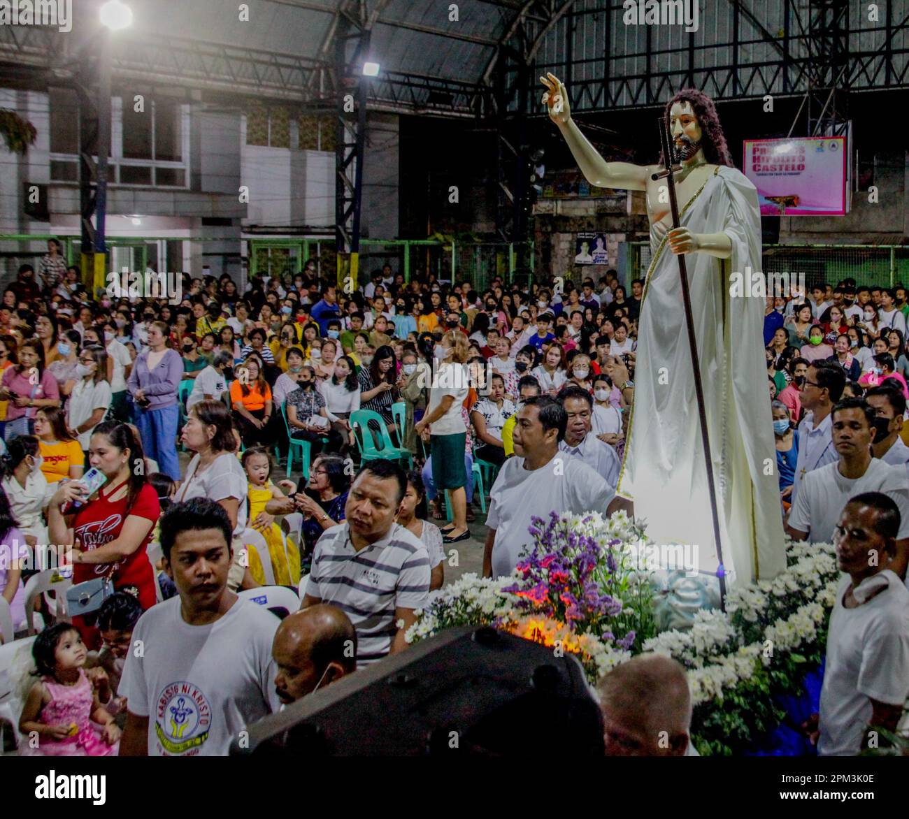 Catholic devotees attend the traditional Salubong followed by Easter Sunday mass at Barangay ...