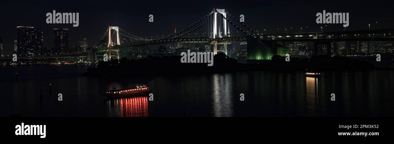 The Rainbow Bridge is a suspension bridge crossing Tokyo Bay between ...