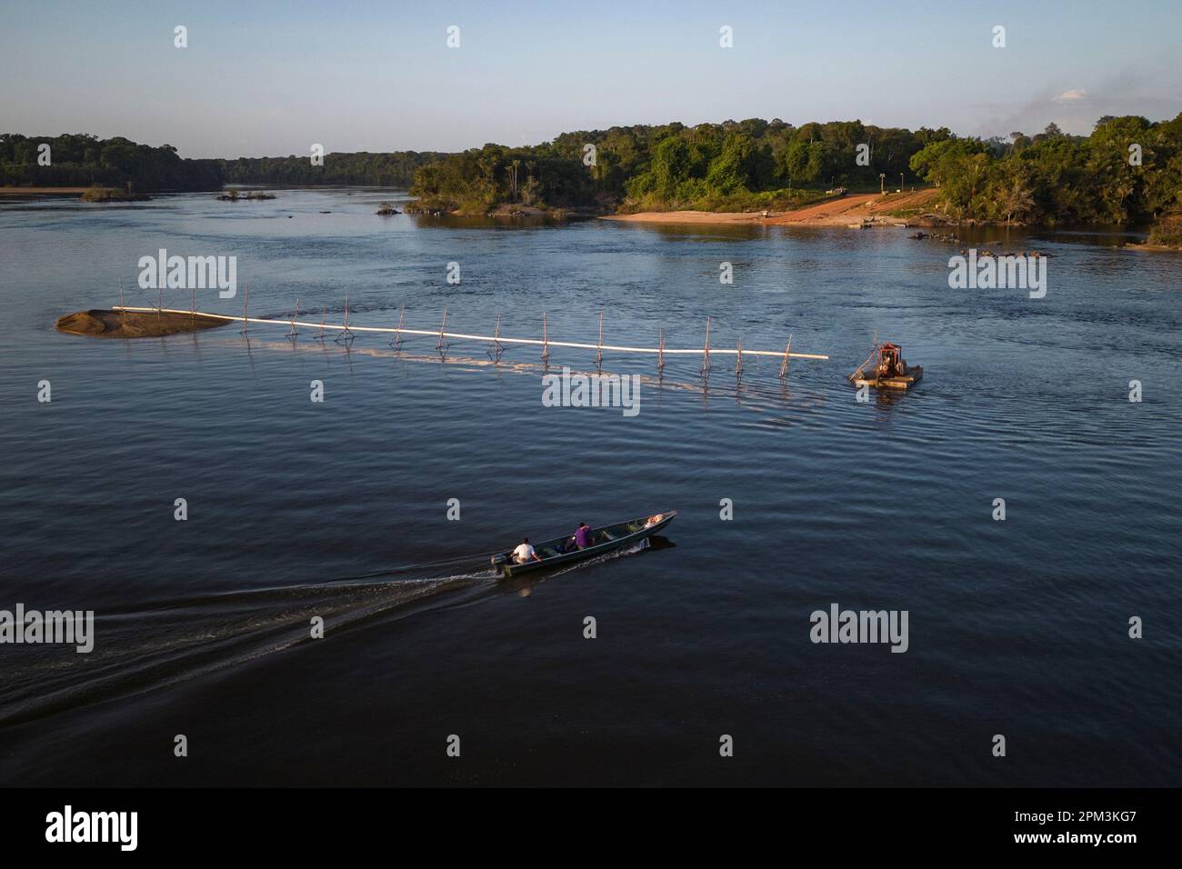 People navigate the Essequibo River at Guyana's Kurupukari crossing ...