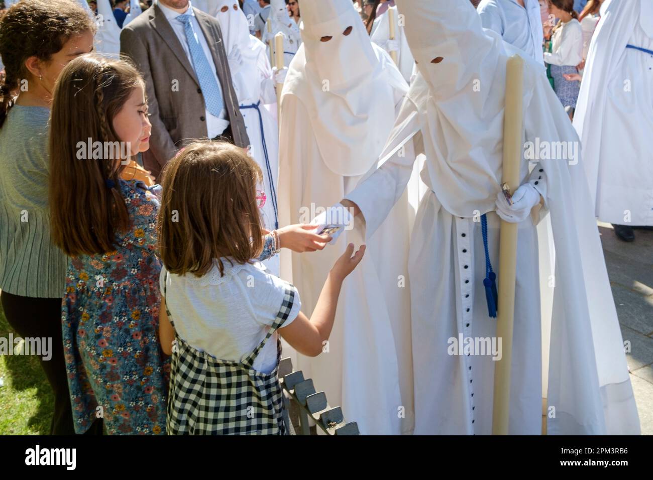 Seville Spain. Holy Week or Semana Santa. Children are given sweets ...