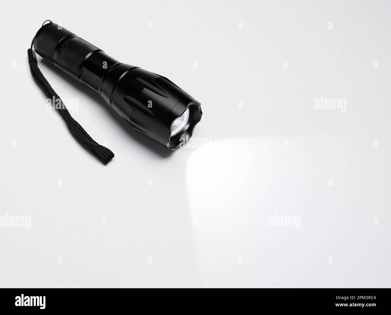 A flashlight isolated on white background Stock Photo - Alamy