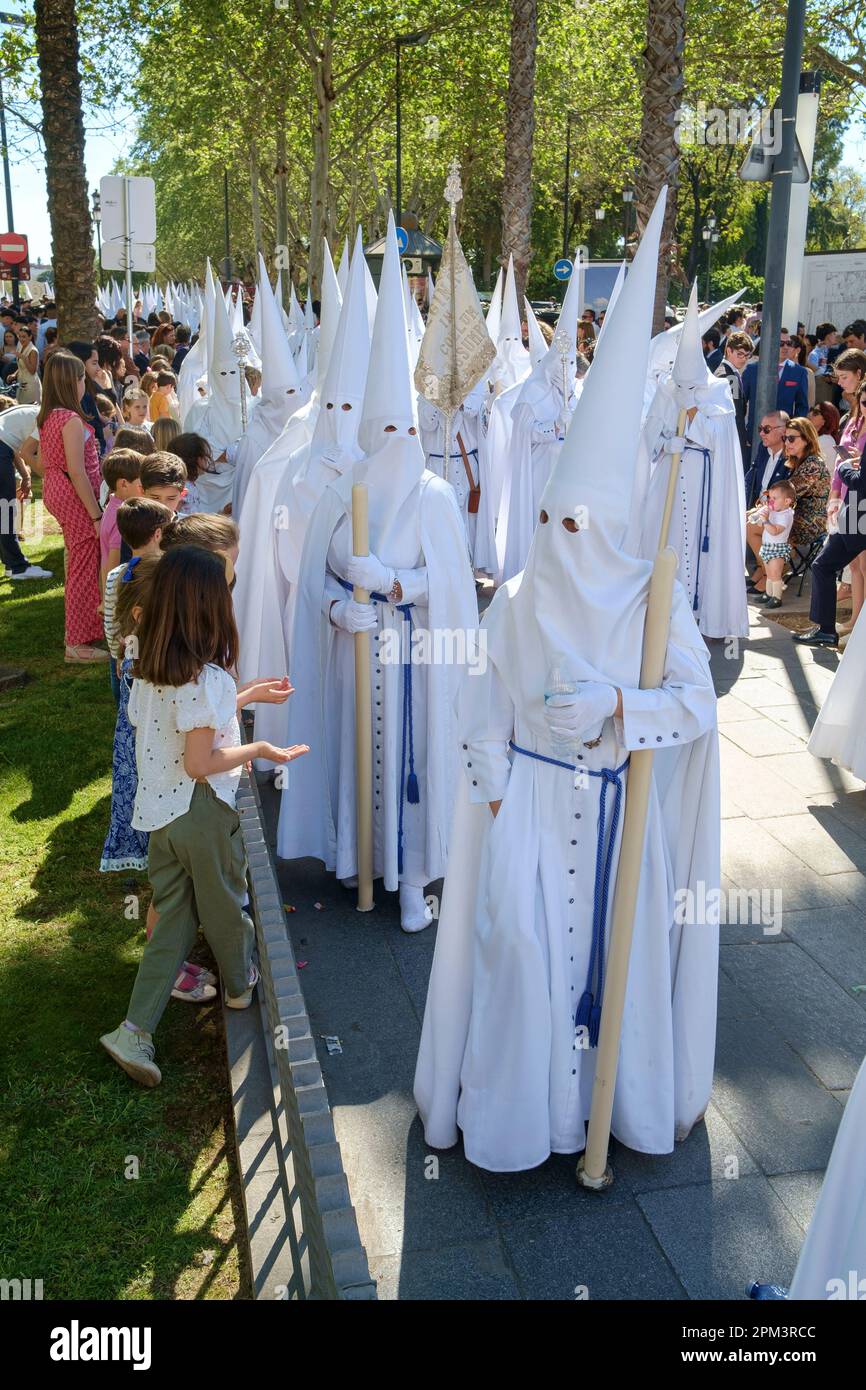 Seville Spain. Holy Week or Semana Santa. Children are given sweets ...