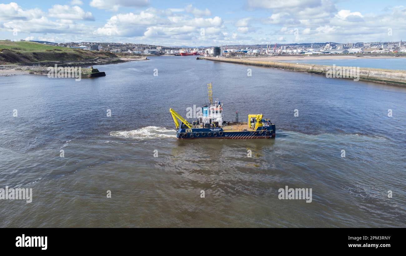 Aberdeen Harbour Scotland. Dredger UKD Seahorse at work in the harbour ...