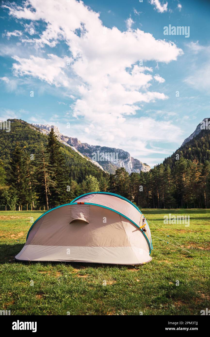 Tent with amazing landscape views of forest and mountains. Camping ...