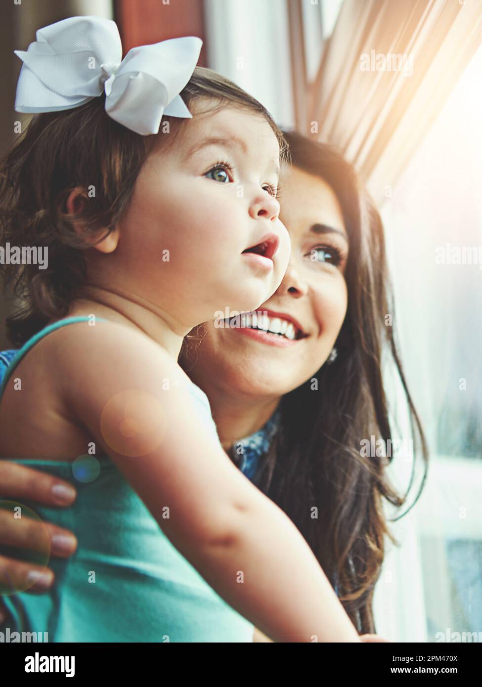 Children are intrigued by the world. a mother and her adorable little ...