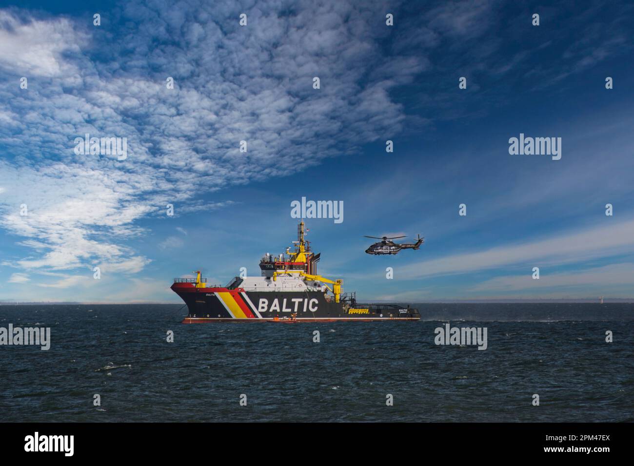 A stunning aerial view of two colossal cargo ships sailing through the ...