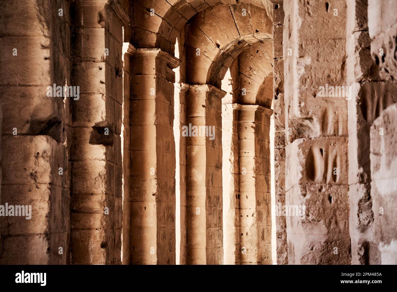 El Jem, Tunisia, January 10, 2023: Portico with columns and buttresses ...