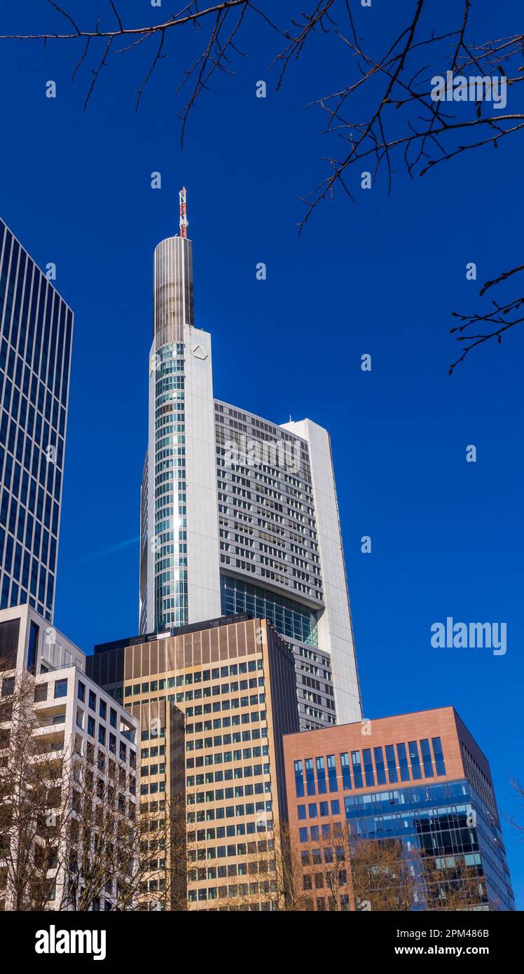 A vertical shot of Commerzbank Tower and other buildings in the ...