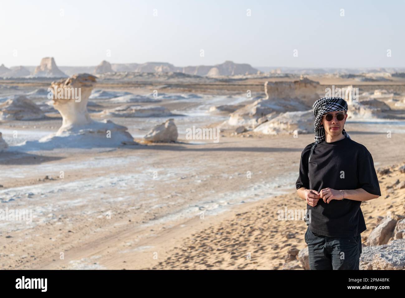 A tourist in the white desert in Bahariya in Egypt Stock Photo - Alamy