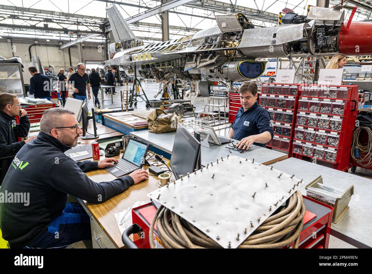 Illustration picture shows technicians working on an F16 fighter jet ...