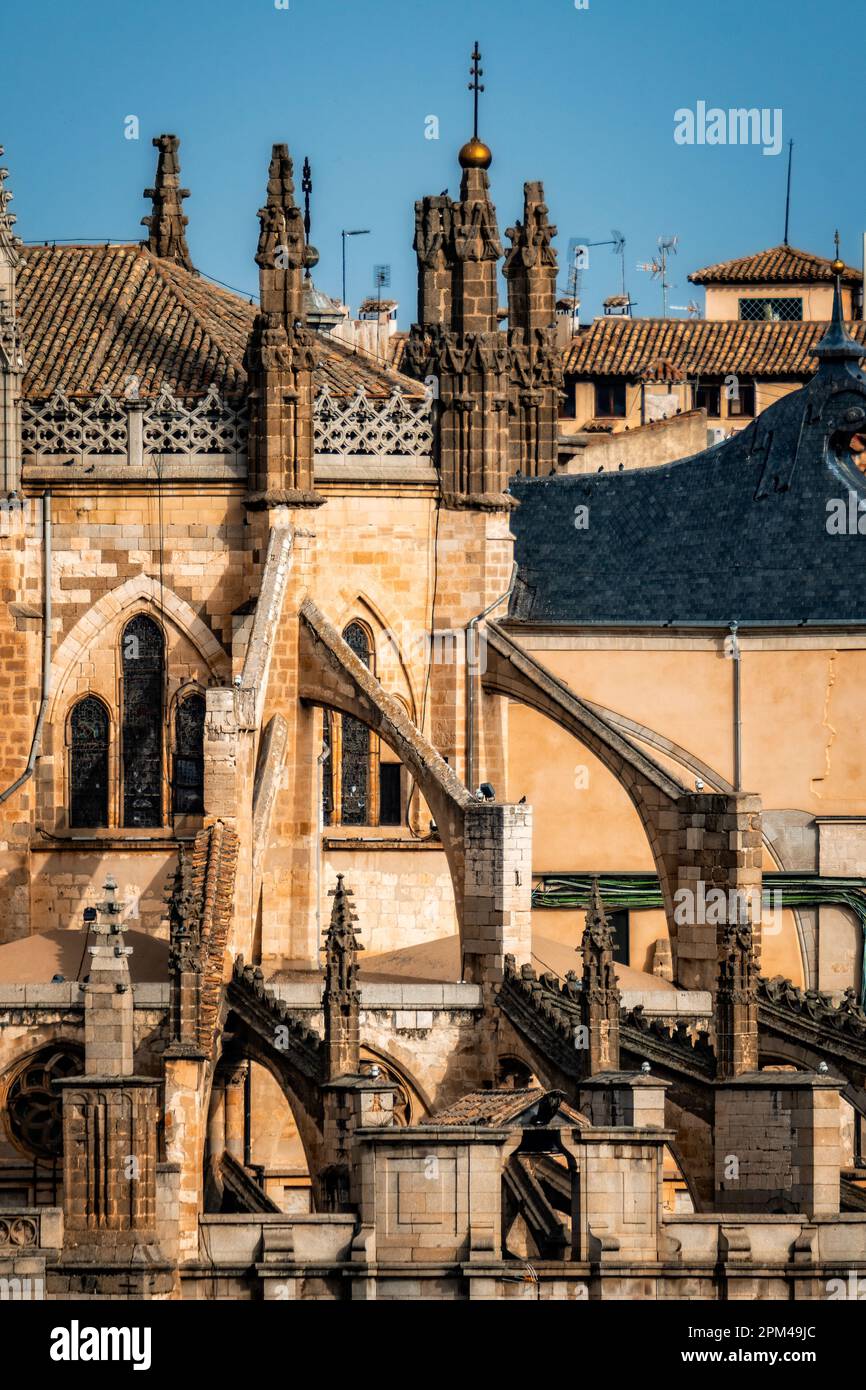 Telephoto lens view of the Cathedral of Toledo. Detail of archs in the ...