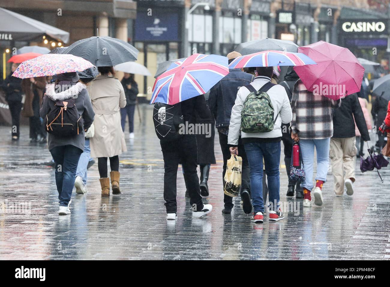 People brave wet and blustery conditions in central London on Easter ...