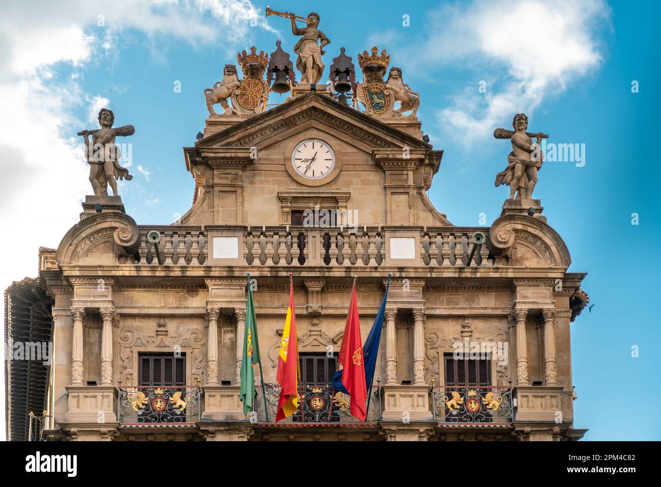 View of Consistorial Square and Town Hall building. Spanish and Navarra ...