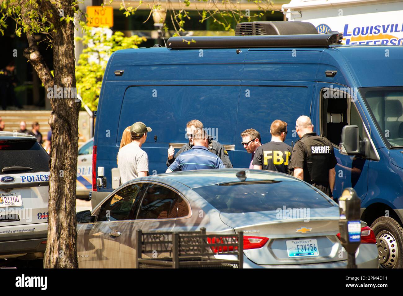 Louisville, Kentucky, USA. 10th April, 2023. Law enforcement officials ... Louisville, Kentucky, USA. 10th April, 2023. Law enforcement officials ...