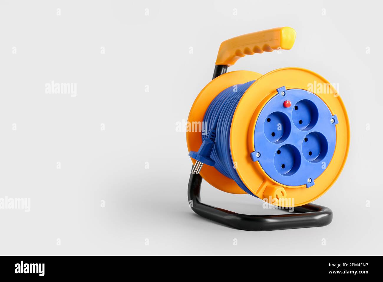 Blue extension electric cable reel on white background Stock Photo - Alamy