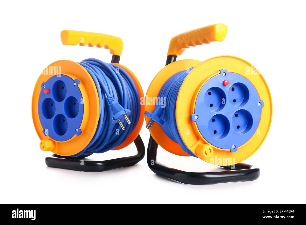Extension electric cable reels on white background Stock Photo - Alamy