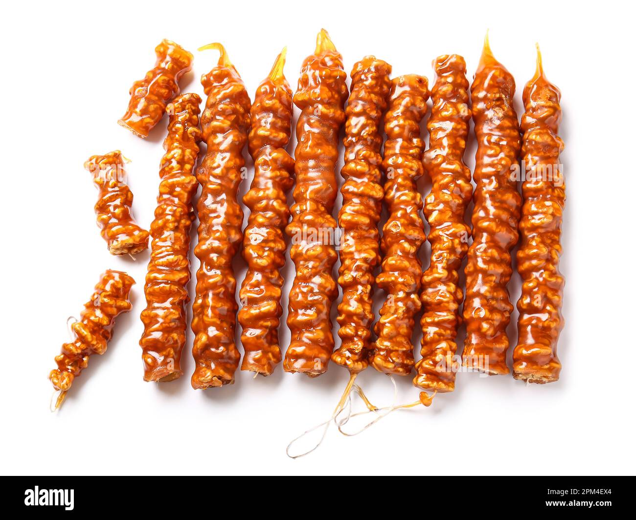 Tasty churchkhela isolated on white background Stock Photo - Alamy