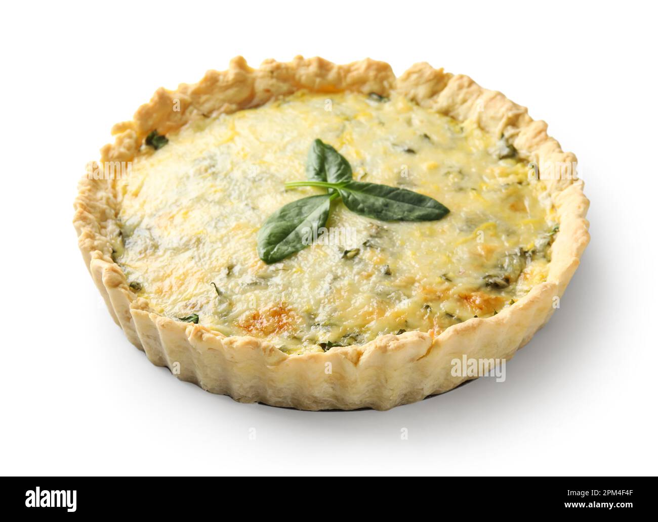 Delicious quiche with spinach leaves isolated on white background Stock ...
