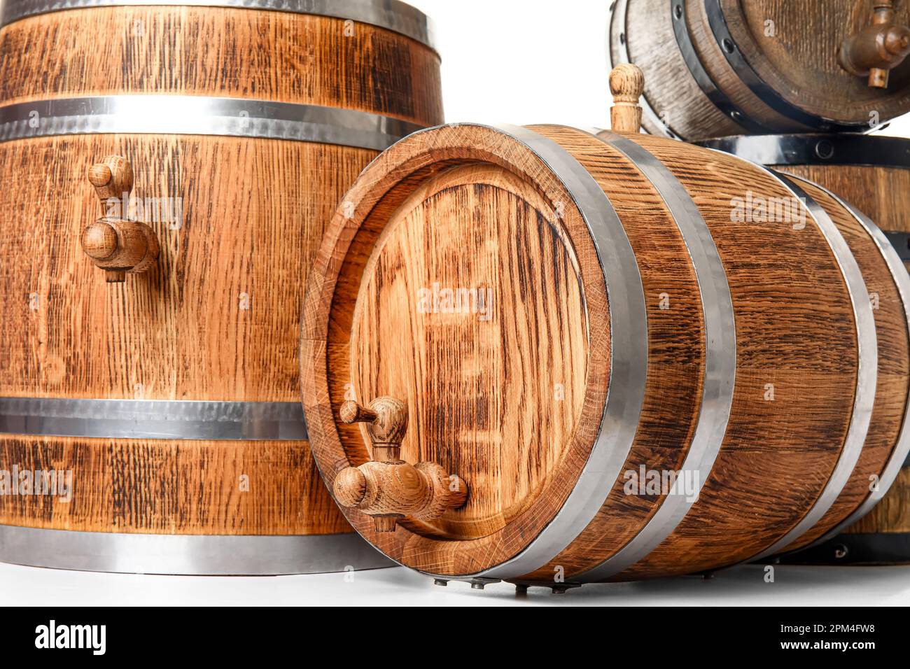 Oak barrels with metal hoops isolated on white background Stock Photo ...
