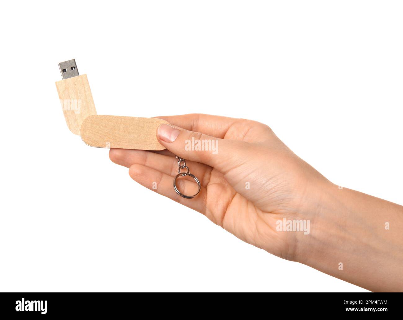 Woman holding wooden USB flash drive isolated on white background Stock ...