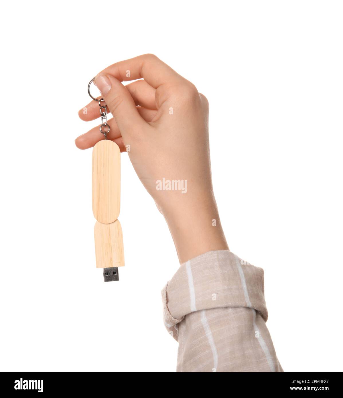 Woman holding wooden USB flash drive isolated on white background Stock ...