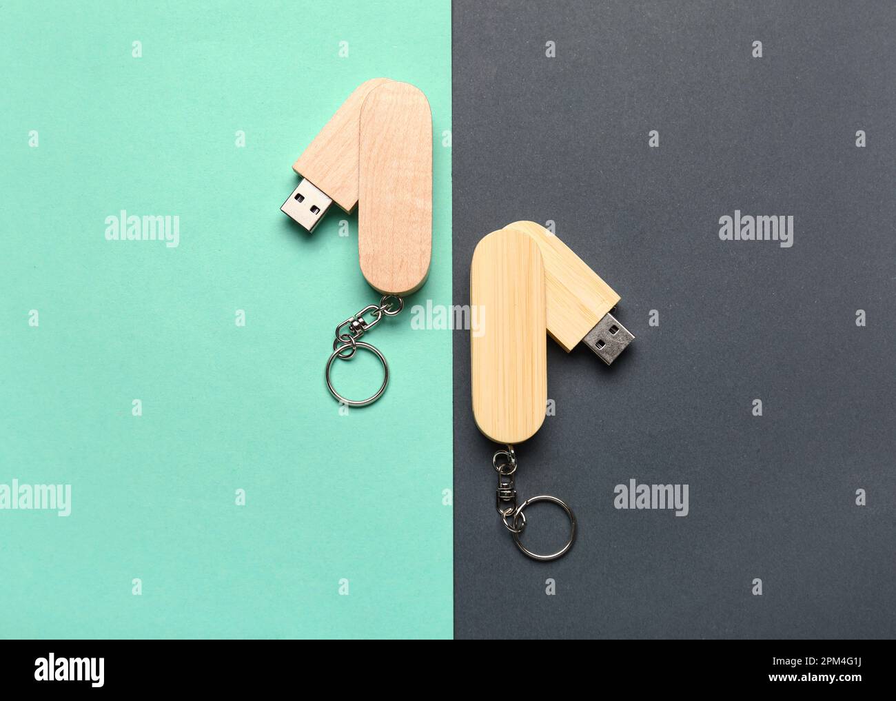 Wooden USB flash drives on turquoise and black background Stock Photo ...