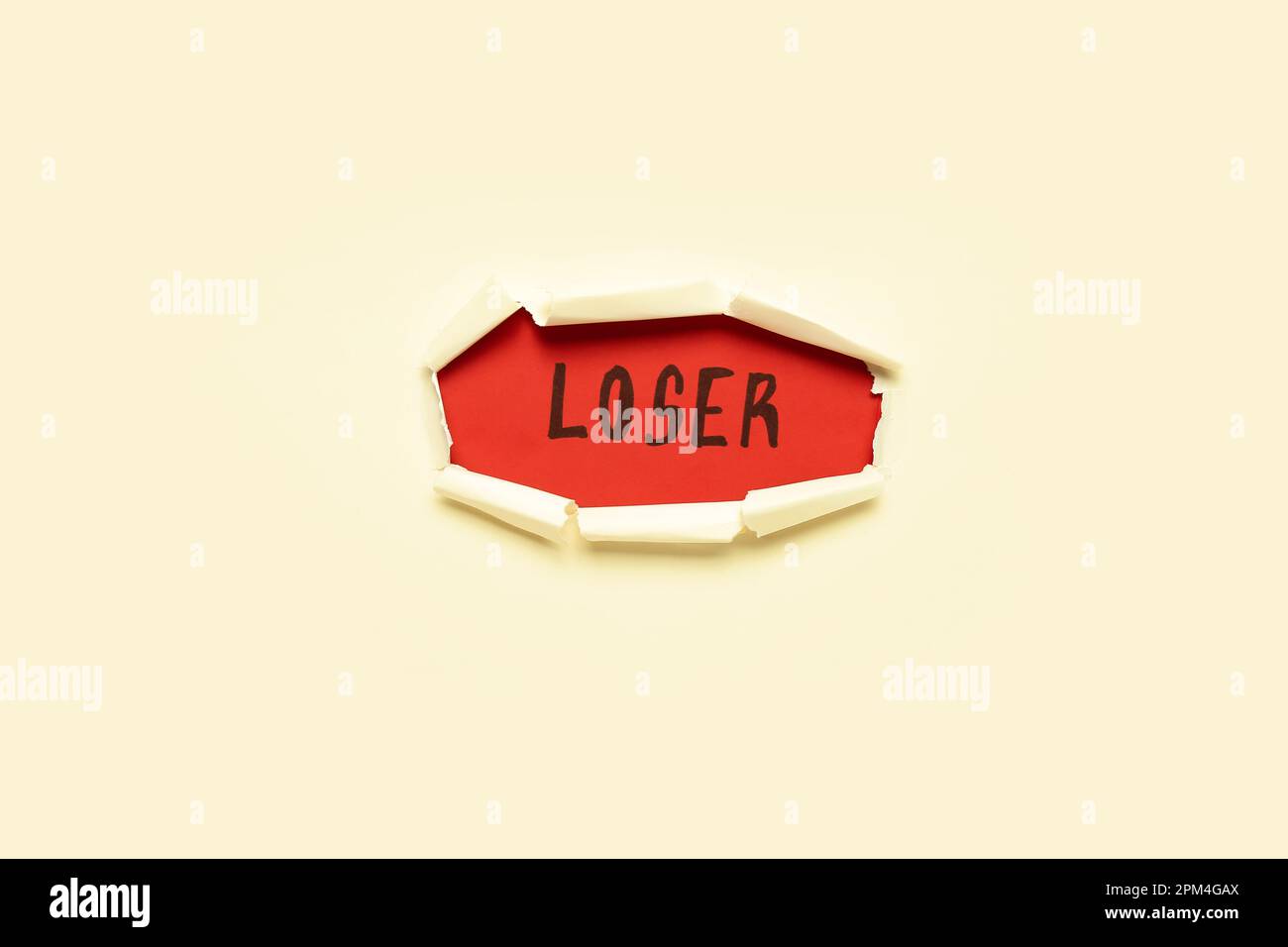 Word LOSER visible through hole in white paper Stock Photo - Alamy
