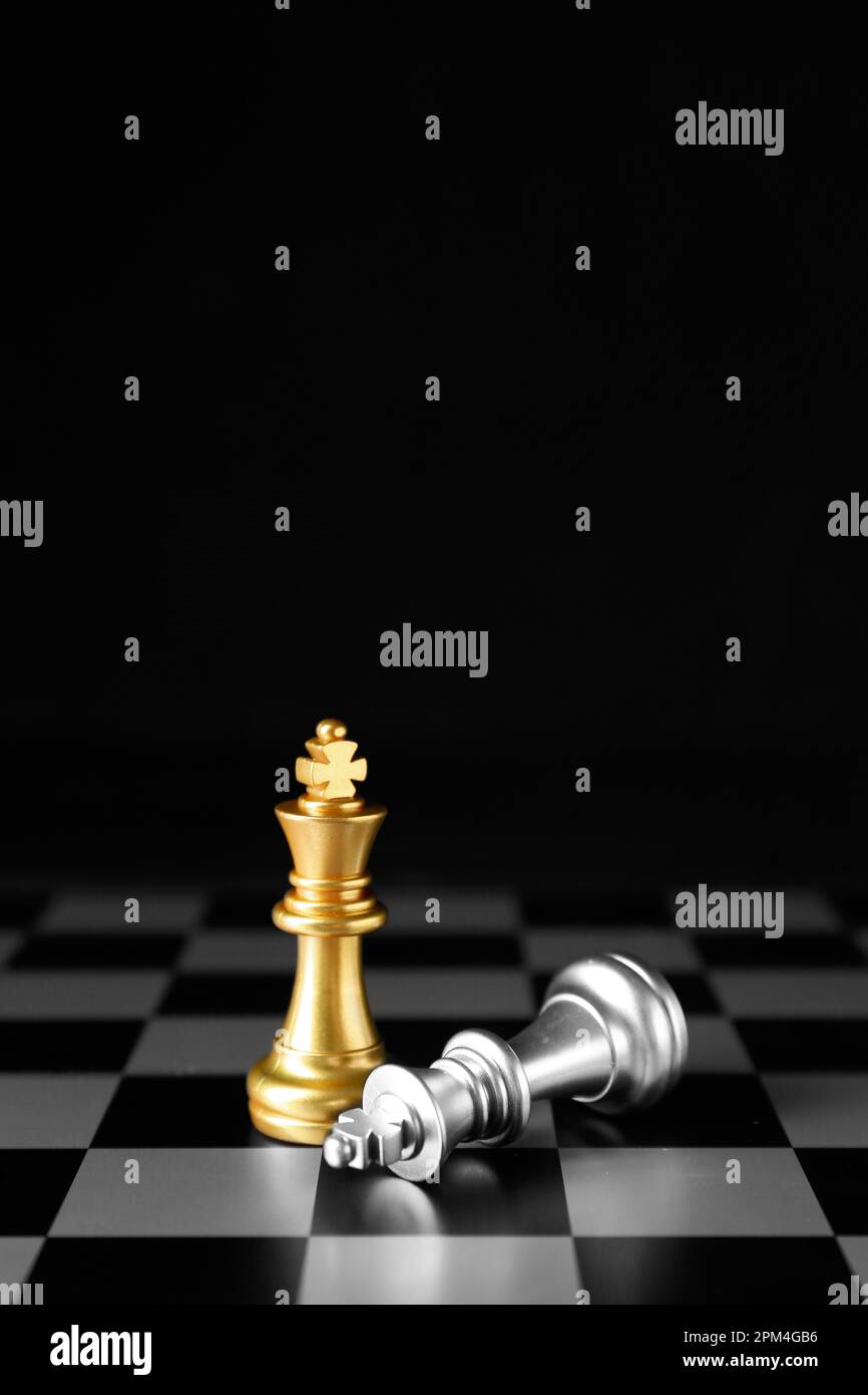 Board with chess pieces on dark background. Loser concept Stock Photo ...