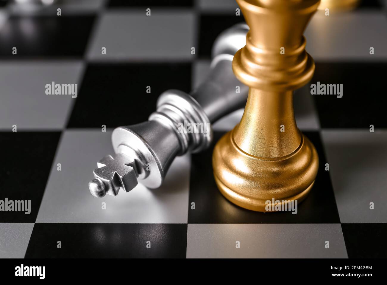 Chess pieces on board, closeup. Loser concept Stock Photo - Alamy