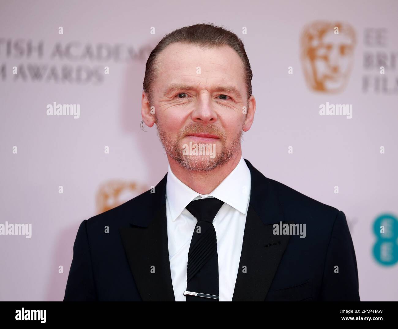 Simon Pegg attends the EE British Academy Film Awards 2022 at Royal ...