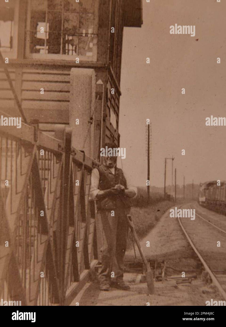 signalman or crossing guard? at GER level crossing Stock Photo - Alamy