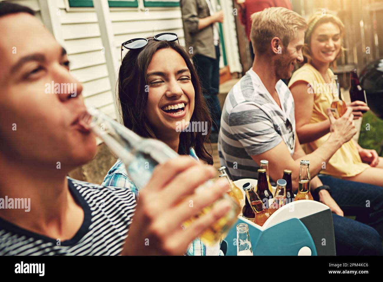 Everyones having a good time. a group of friends enjoying a party ...