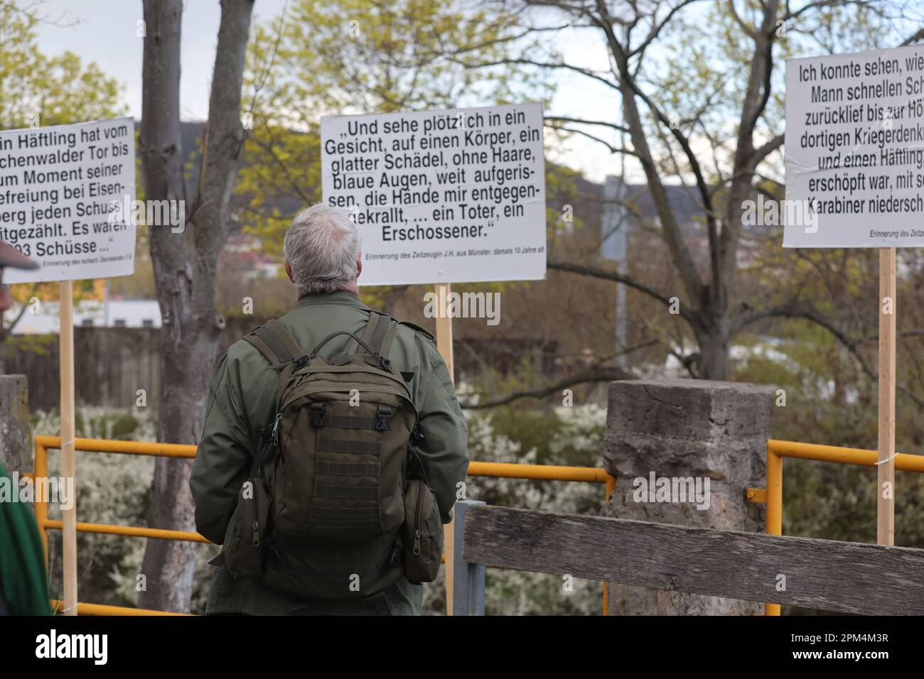 Jena, Germany. 11th Apr, 2023. A participant in an event commemorating ...
