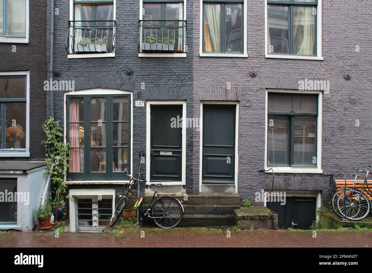 old brick houses in amsterdam (the netherlands Stock Photo - Alamy