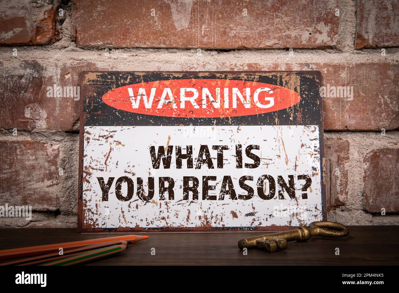 What is your reason. Warning sign with text on wooden shelf Stock Photo ...