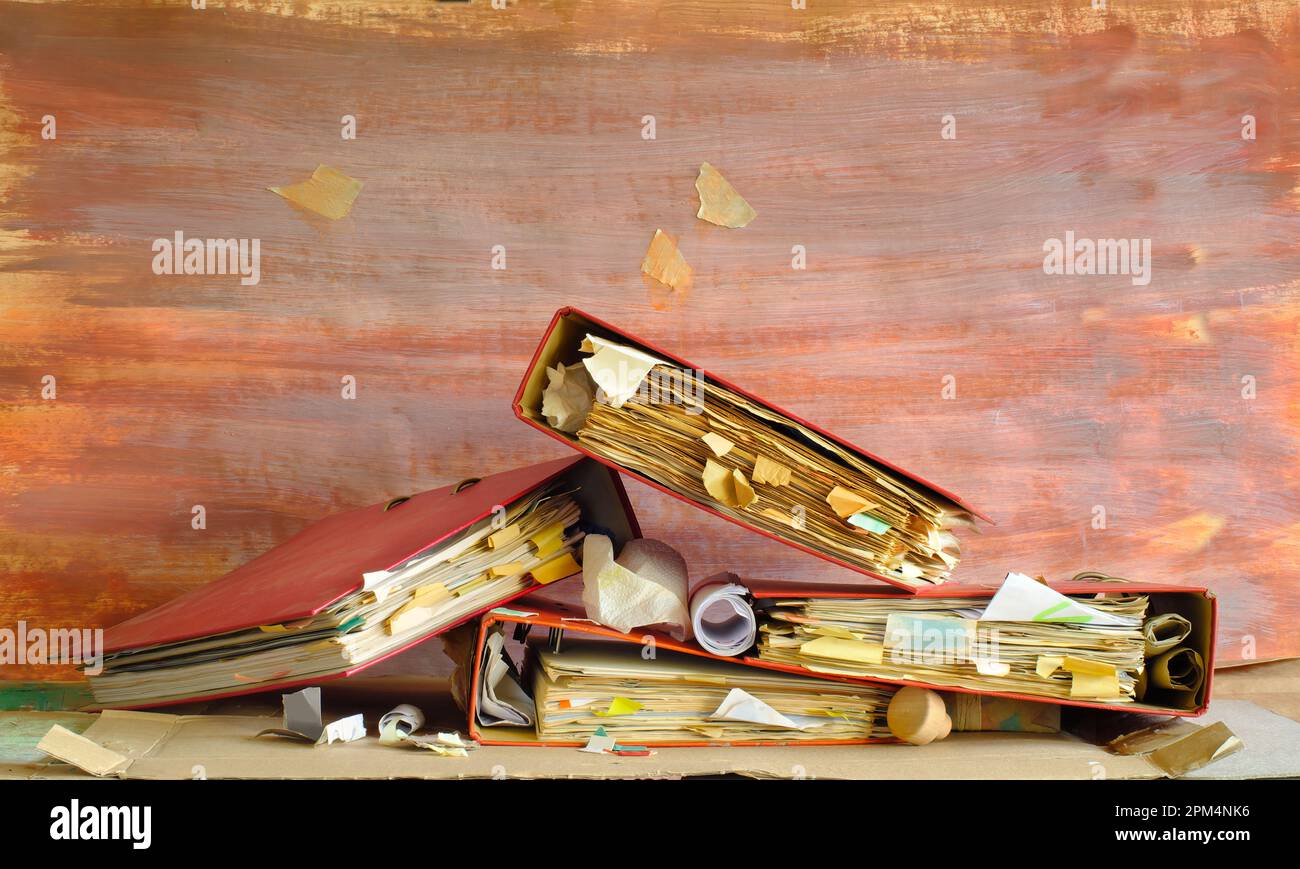 heap of messy file folders, red tape, bureaucracy, chaos, business ...