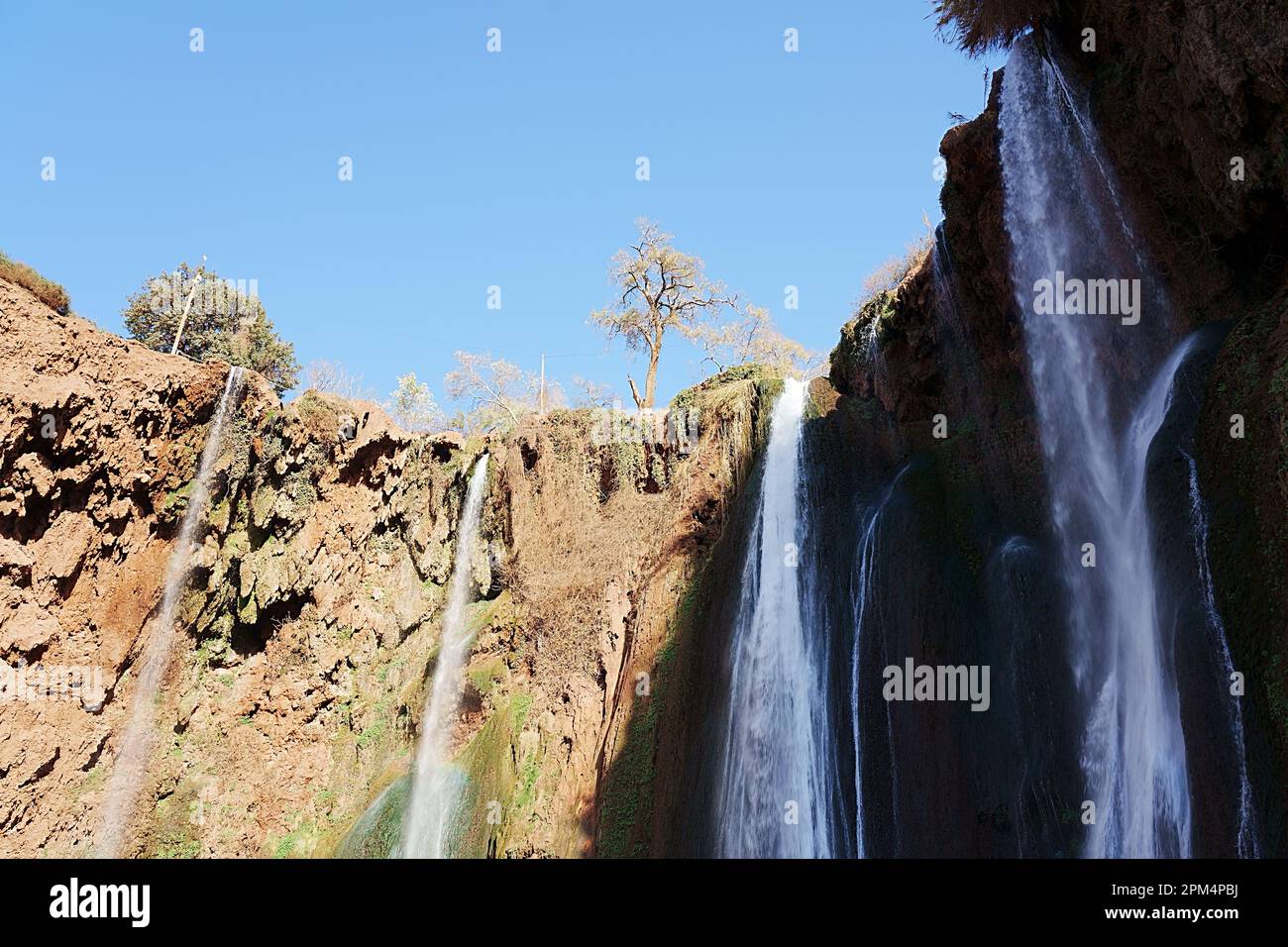 Ouzoud waterfalls at Azilal province in Morocco, clear blue sky in 2023 ...