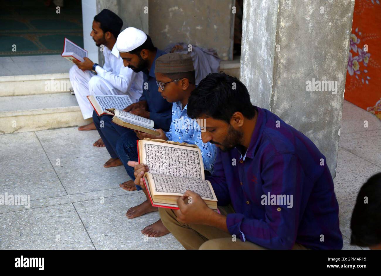 Faithful Muslims busy in prayer as they perform Itikaf worship at ...