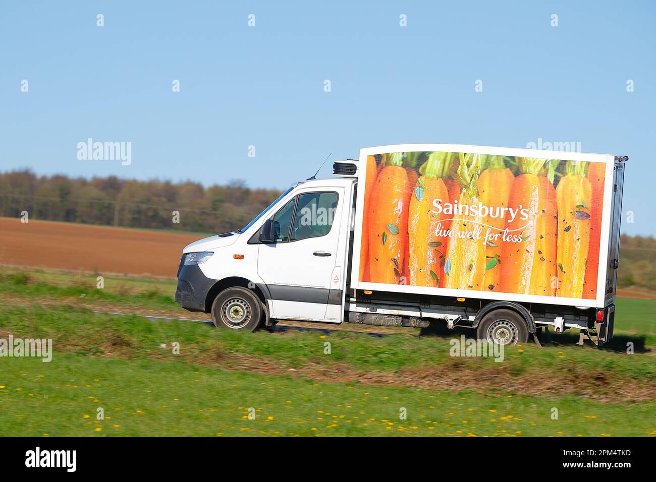 Sainsbury's delivery vehicle delivering groceries to residents in ...