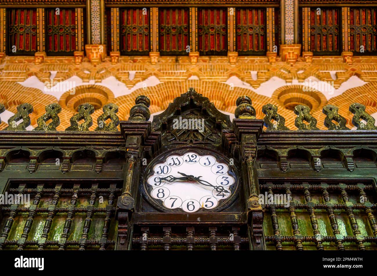 Old clock in the center of the ticket booth wood structure. Antique ...