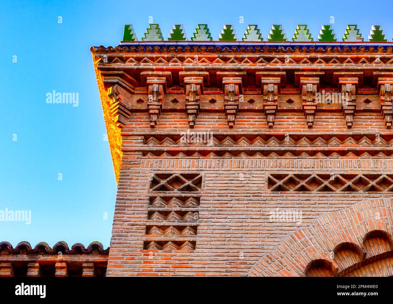 Red brick decoration in the building corner. Old antique architecture ...