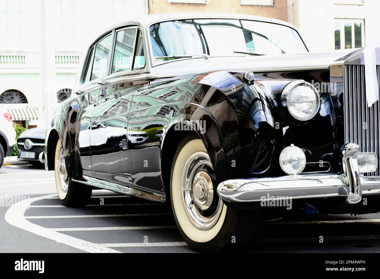 classic old British made elegant, expensive car in closeup. headlights ...