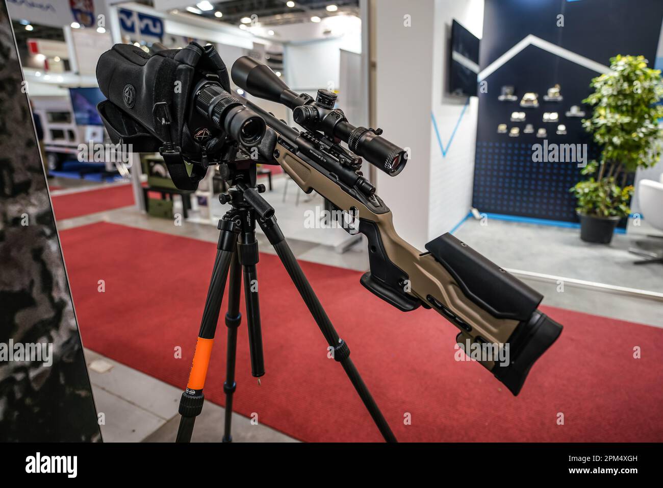 Brno, Czechia - October 08, 2021: Modern rifle mounted on large tripod ...