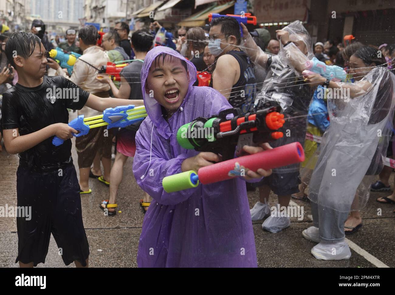 People splash water during Songkran Festival at Kowloon City. 09APR23 ...