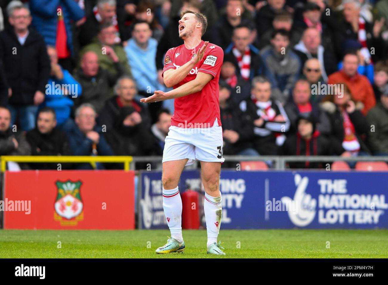 James Jones of Wrexham reacts after a missed opportunity at goal during ...